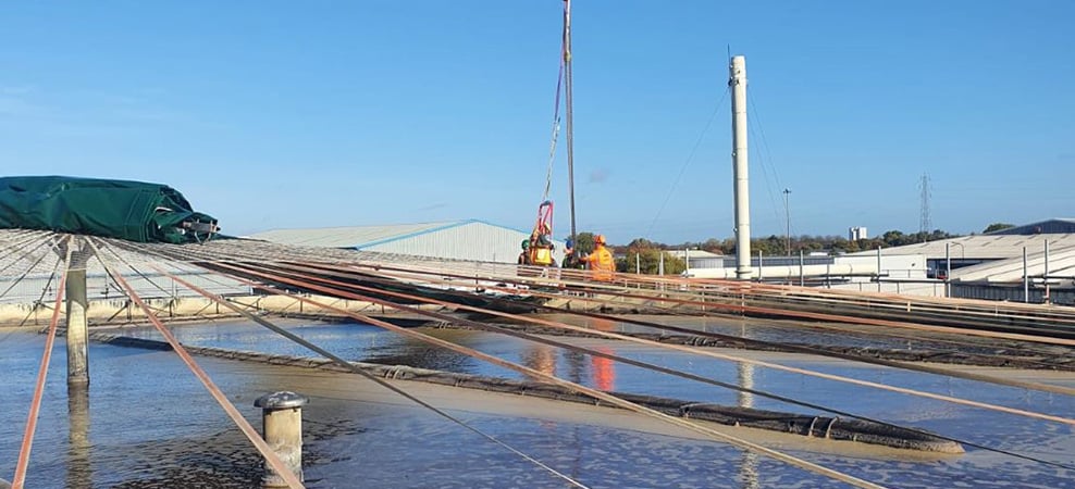 Mobile crane team backs digester membrane installation | Hird